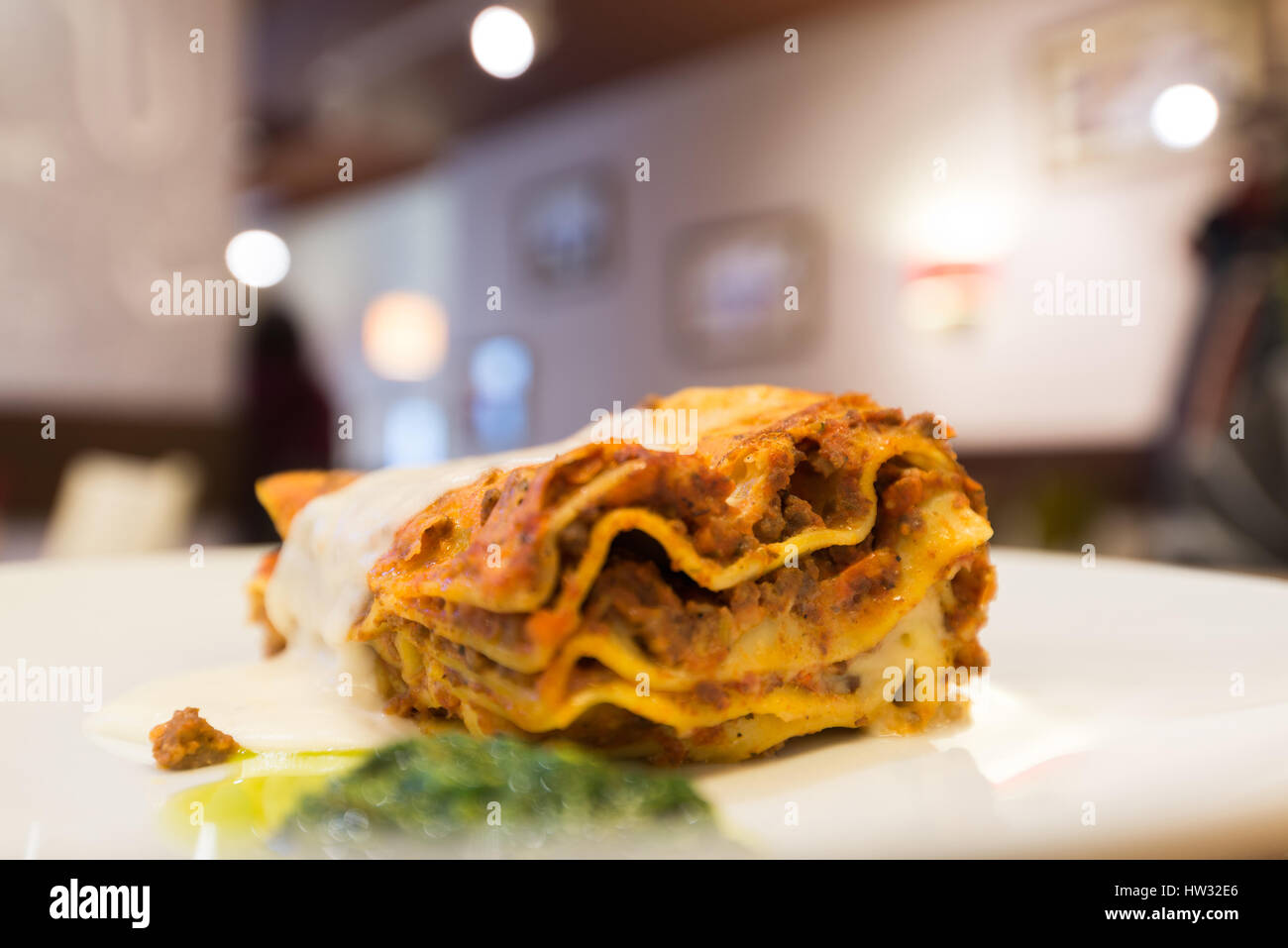 Lasagna on the table in the restaurant Stock Photo - Alamy