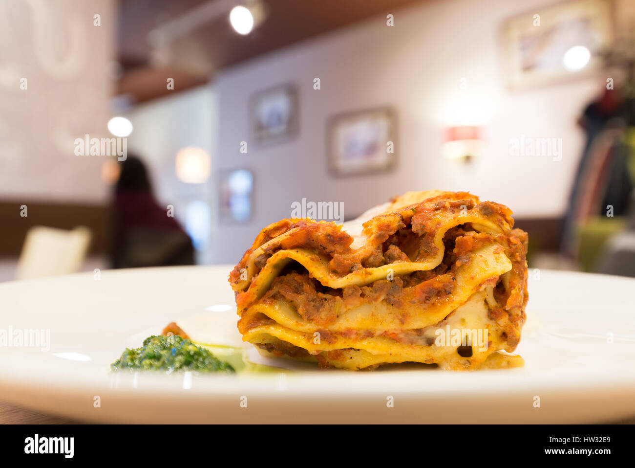 Lasagna on the table in the restaurant Stock Photo - Alamy