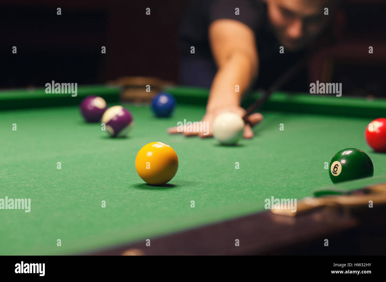 Playing billiard - Close-up shot of a man playing billiard Stock Photo ...