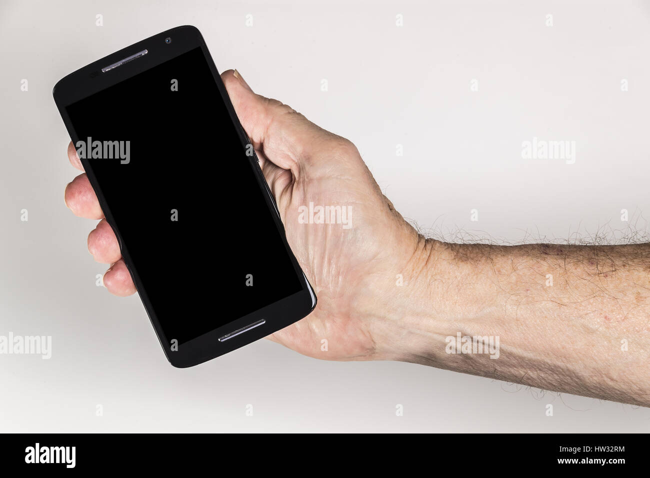 cell phone in man's hand with black screen Stock Photo - Alamy