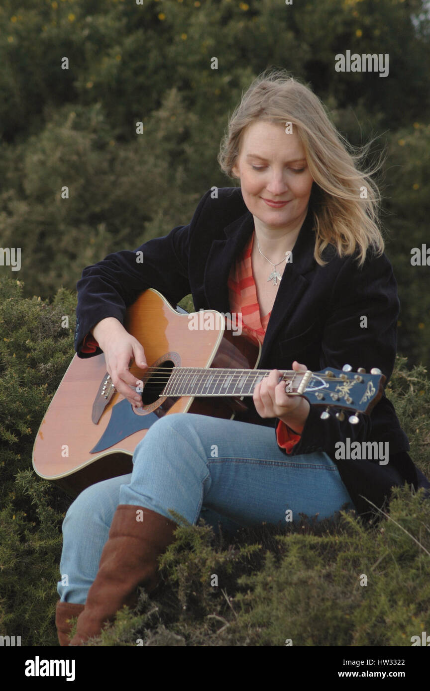 Singer Songwriter in The New Forest, Hampshire, England Stock Photo - Alamy