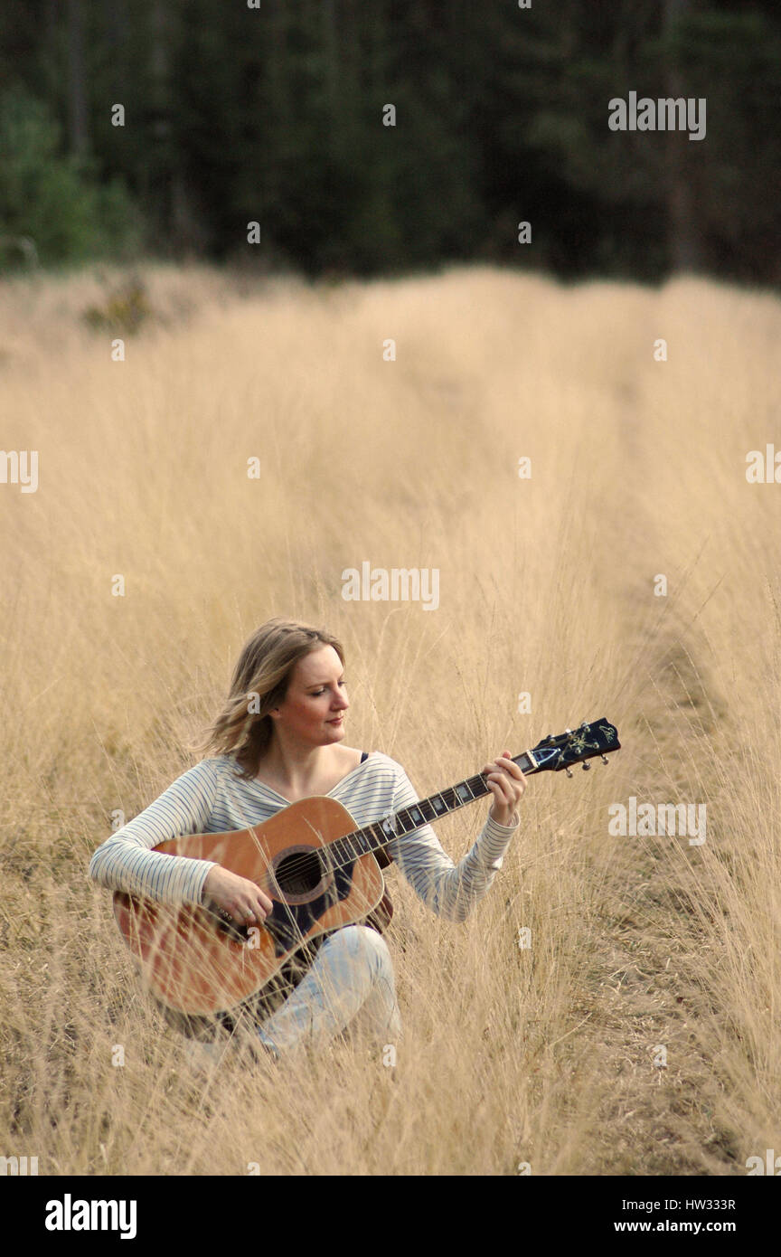 Singer Songwriter in The New Forest, Hampshire, England Stock Photo - Alamy