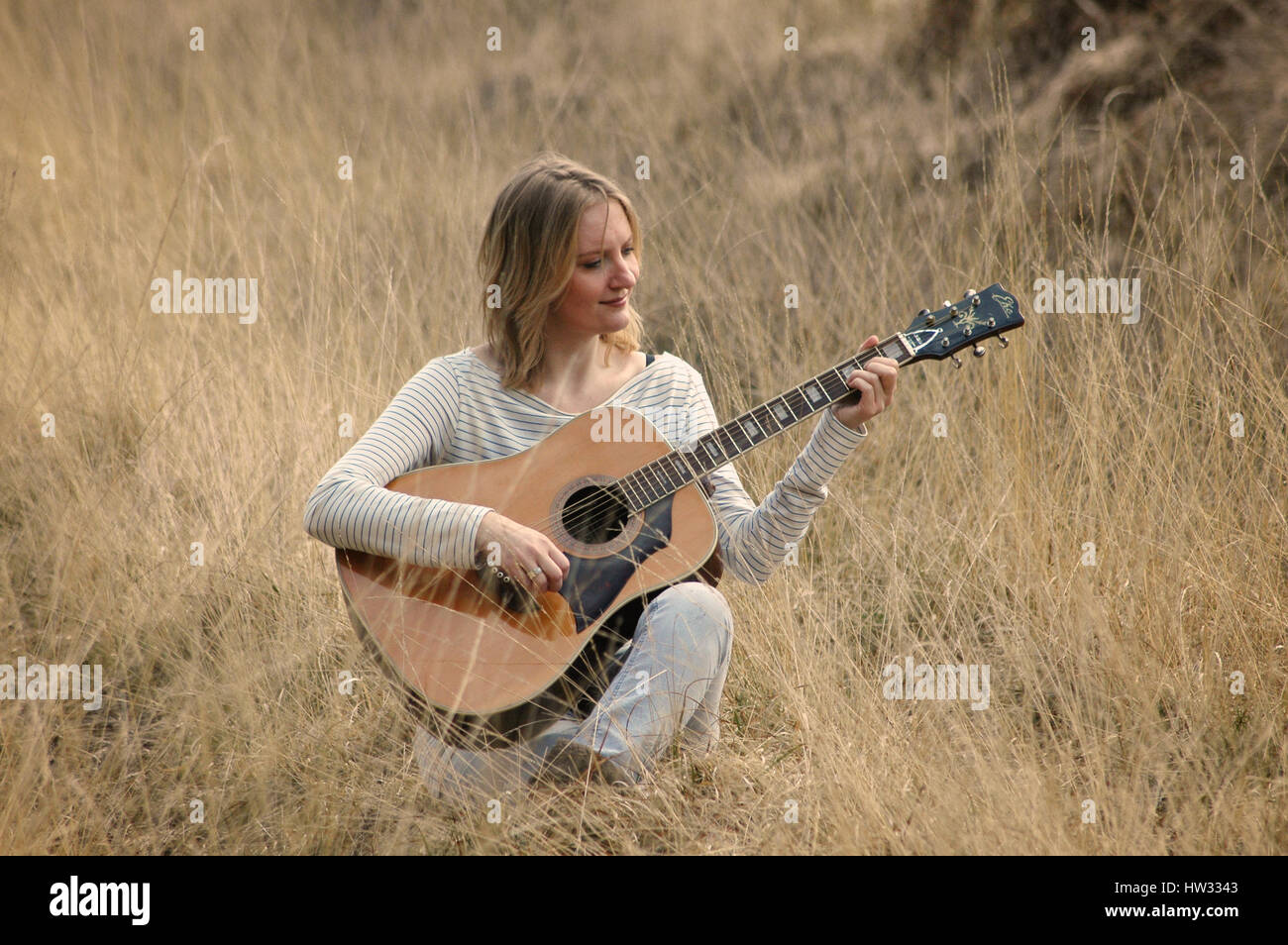 Singer Songwriter in The New Forest, Hampshire, England Stock Photo - Alamy
