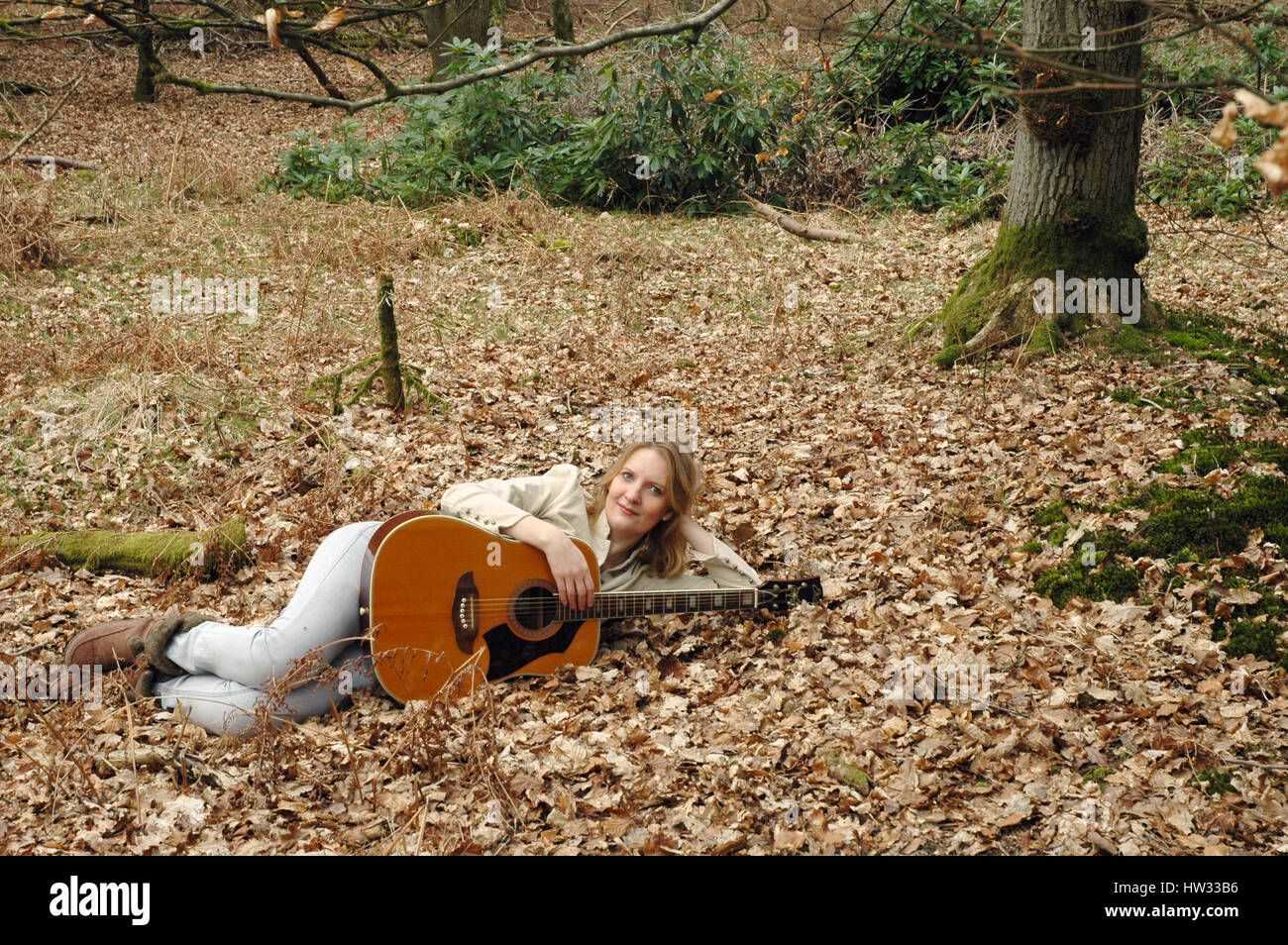 Singer Songwriter in The New Forest, Hampshire, England Stock Photo - Alamy