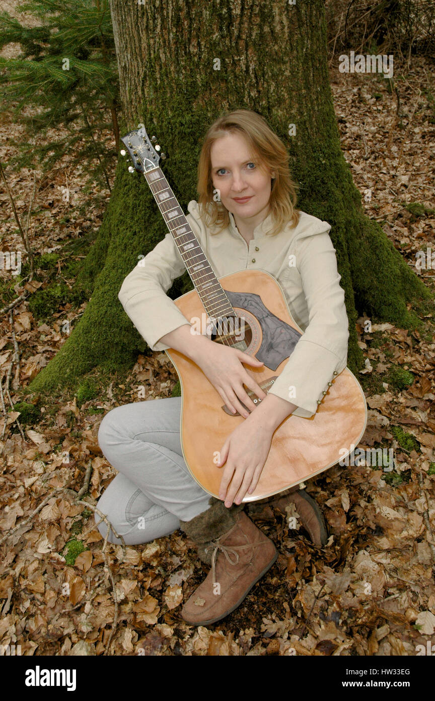 Singer Songwriter in The New Forest, Hampshire, England Stock Photo - Alamy