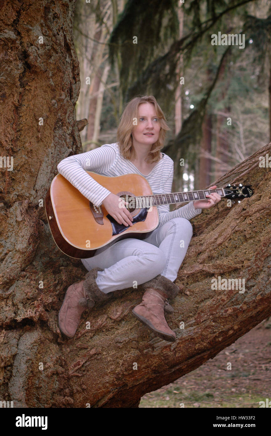 Singer Songwriter in The New Forest, Hampshire, England Stock Photo - Alamy