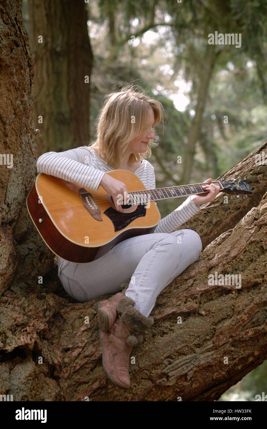 Singer Songwriter in The New Forest, Hampshire, England Stock Photo - Alamy
