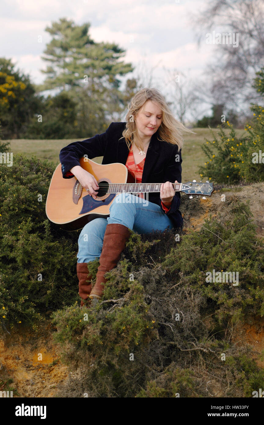 Singer Songwriter in The New Forest, Hampshire, England Stock Photo - Alamy