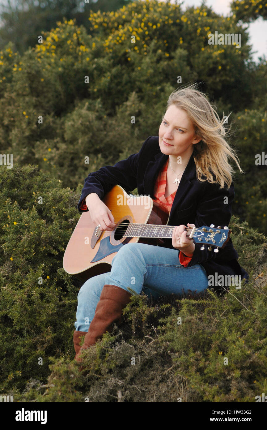 Singer Songwriter in The New Forest, Hampshire, England Stock Photo - Alamy