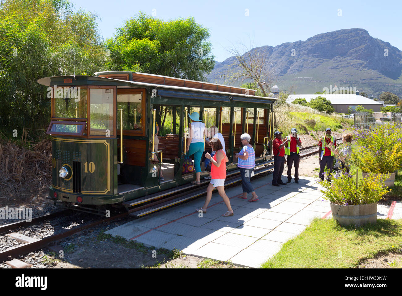 Franschhoek Wine Tram - tourists getting on the wine tram for wine ...