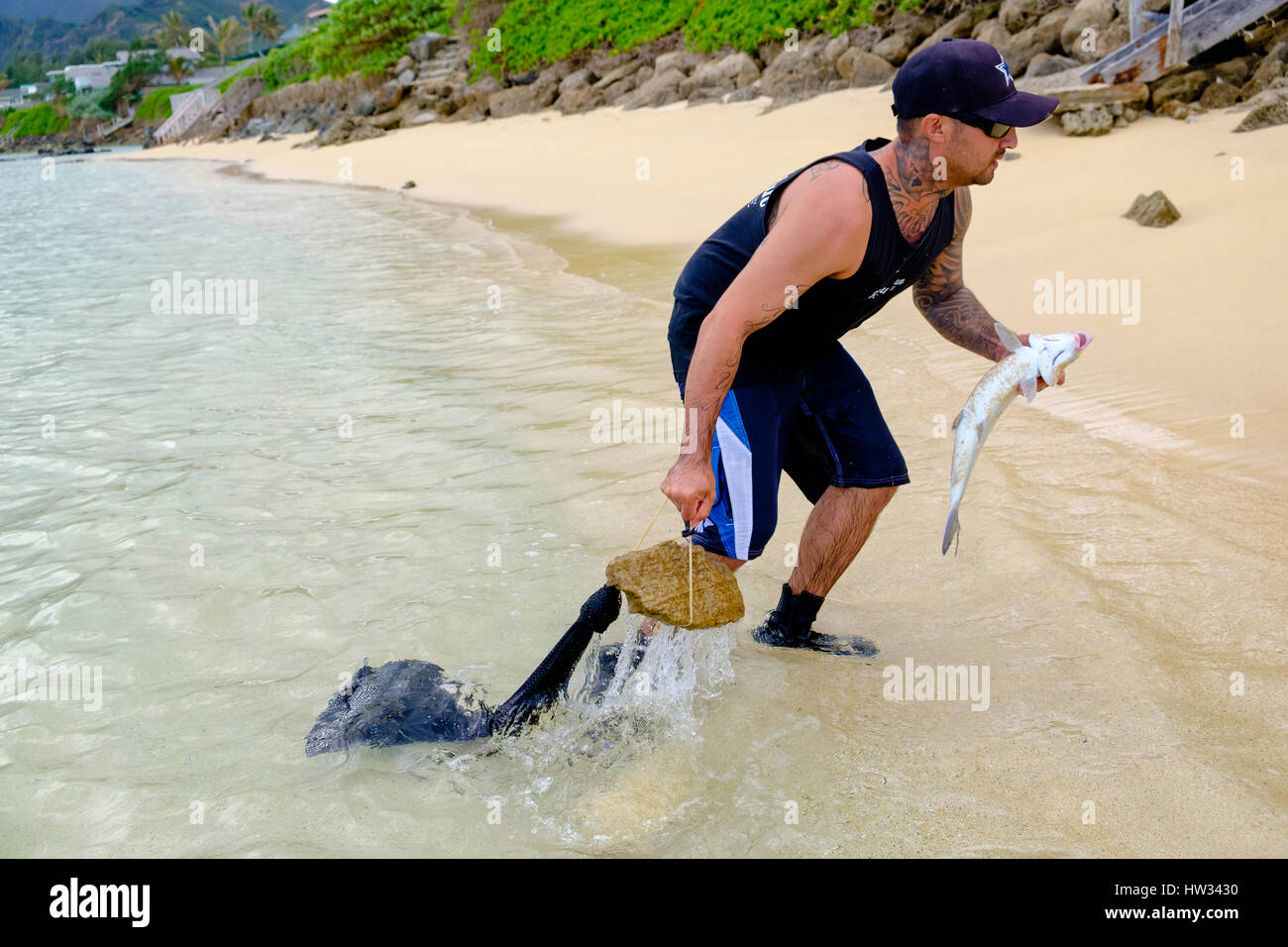 LAIE, HAWAII - FEBRUARY 24, 2017: Fisherman Jameson Humalon competes in ...