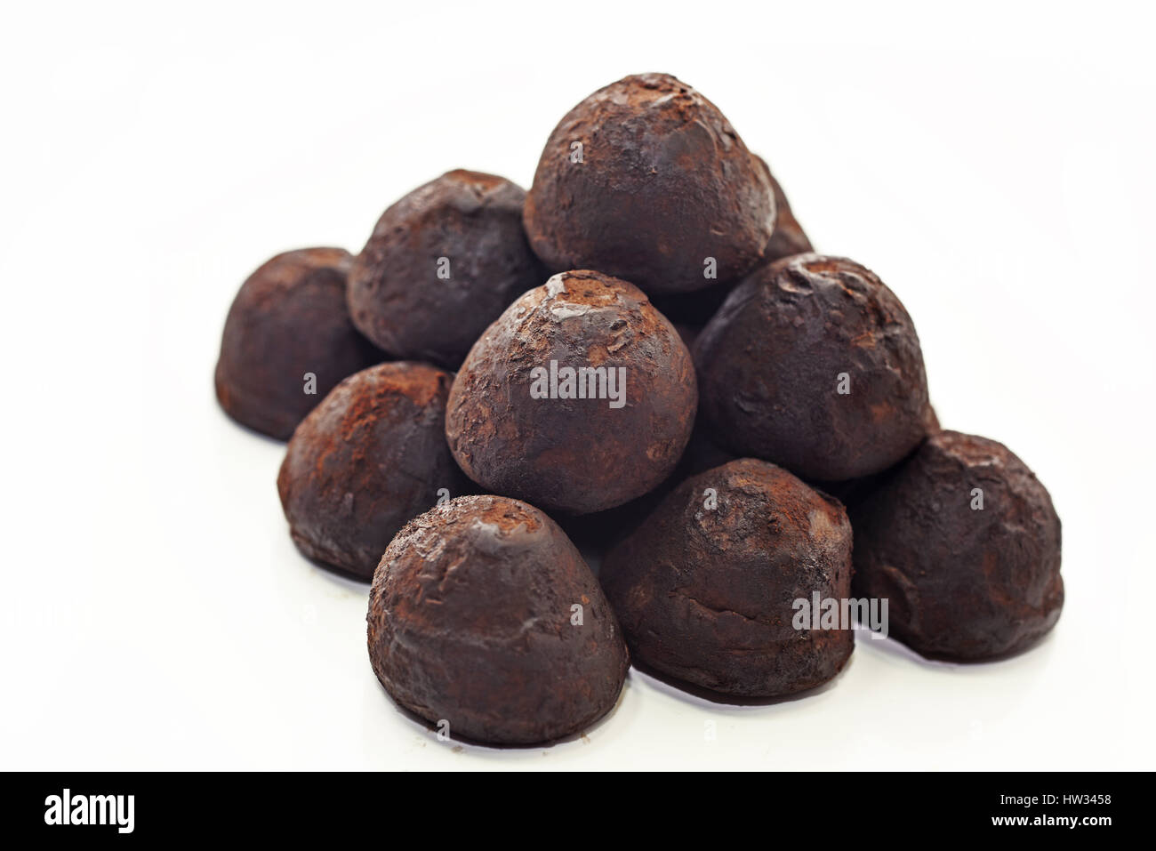 Pyramid of chocolate. Isolated on white background Stock Photo - Alamy