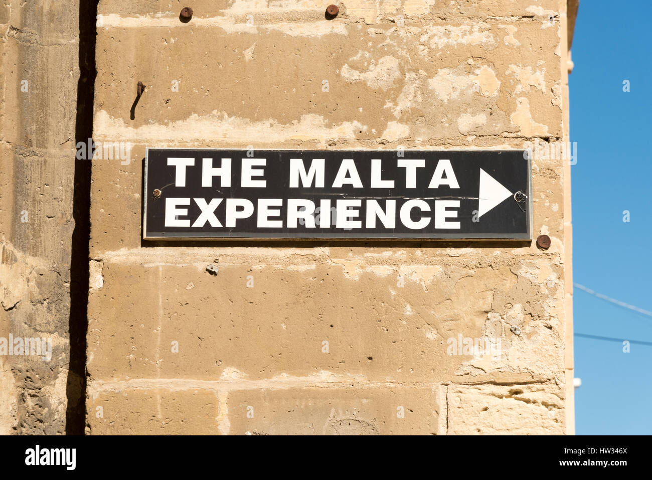 A sign for the malta experience tourist attraction in Valetta Malta ...