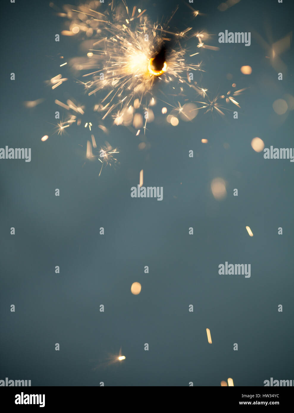 Sparkler burning and glowing in the dark Stock Photo - Alamy