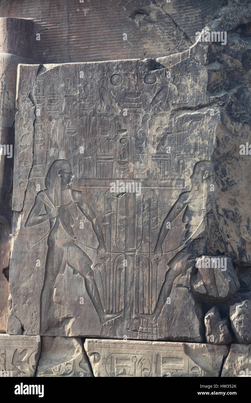 Relief on a Colossi of Memnon showing Hapi joining the two lands Stock ...