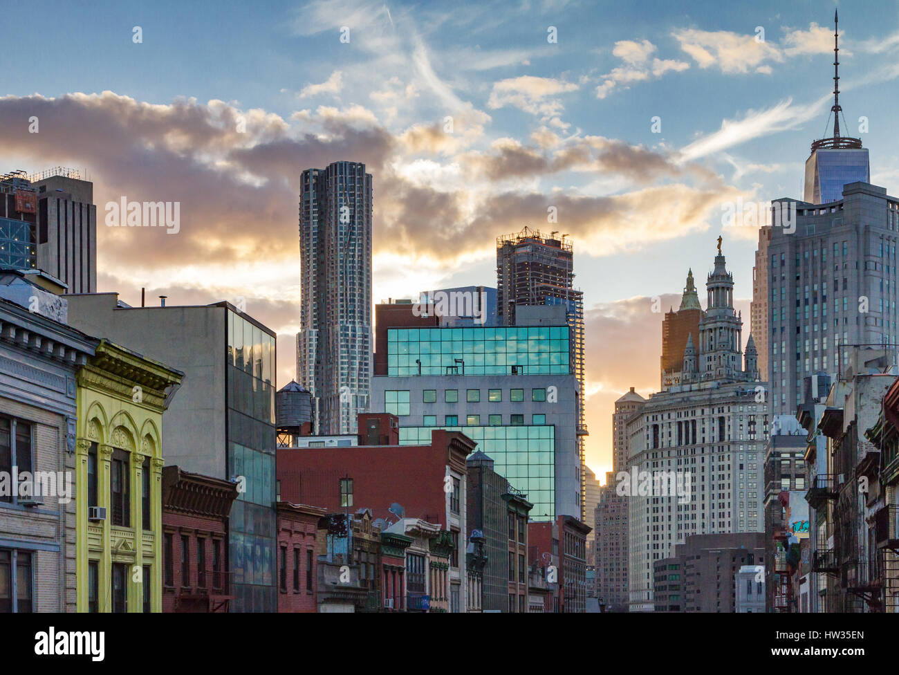 Colorful sunset behind the downtown skyline buildings of Chinatown in ...