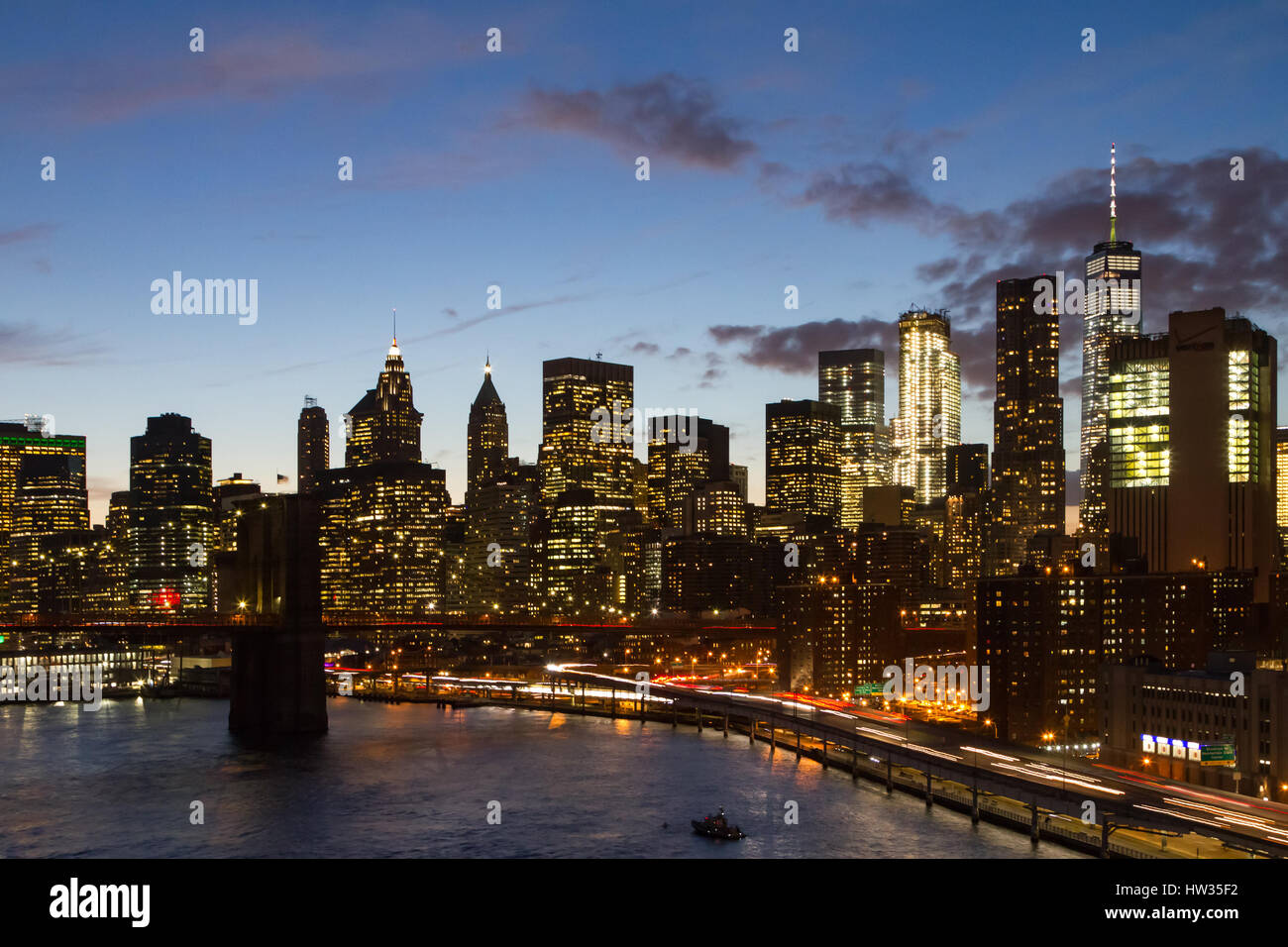 Night Lights of the New York City downtown skyline at dusk in Manhattan ...