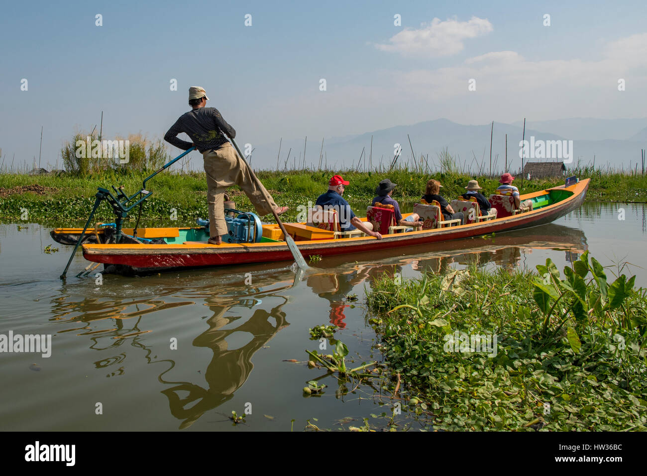 Tourist Boat Boatman Rowing on Inle Lake, Myanmar Stock Photo - Alamy