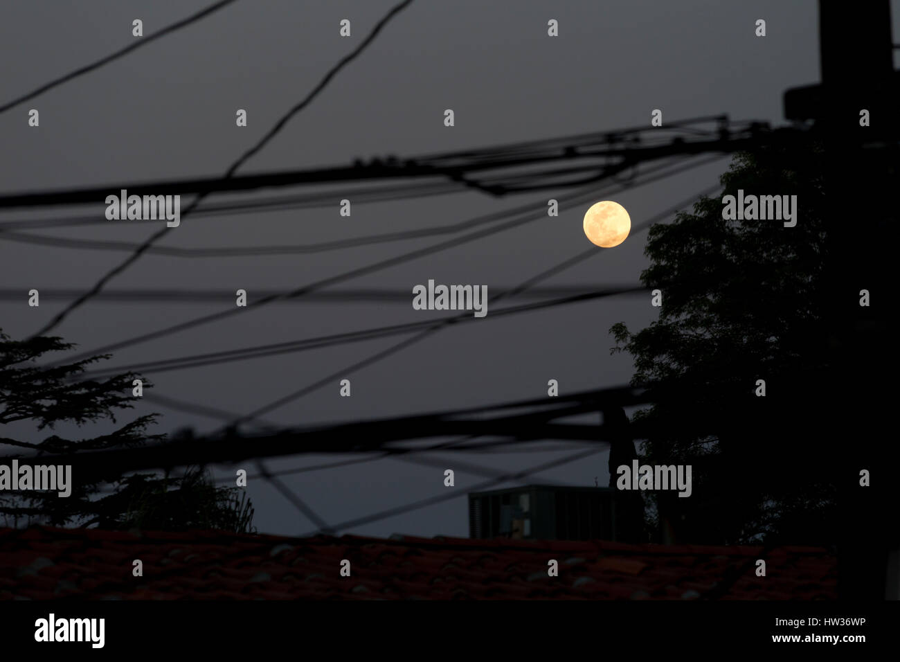 The urban full moon Stock Photo - Alamy