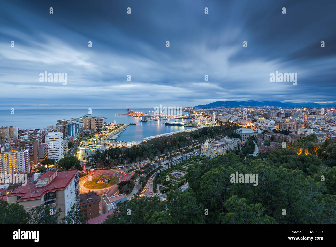 Cityscape of Malaga in Spain at evening from vantage point Stock Photo ...