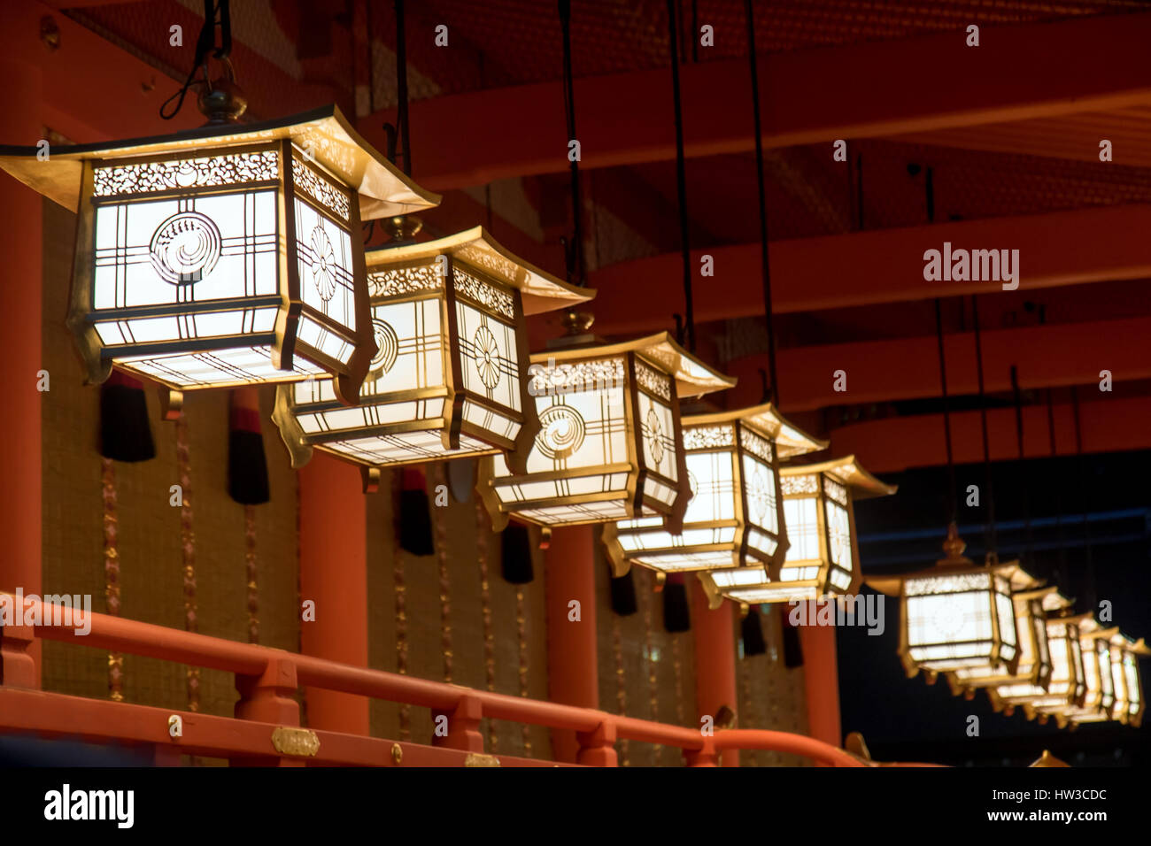 Line of decorative lamps lighting in the temple Fushimi Inari Shrine ...