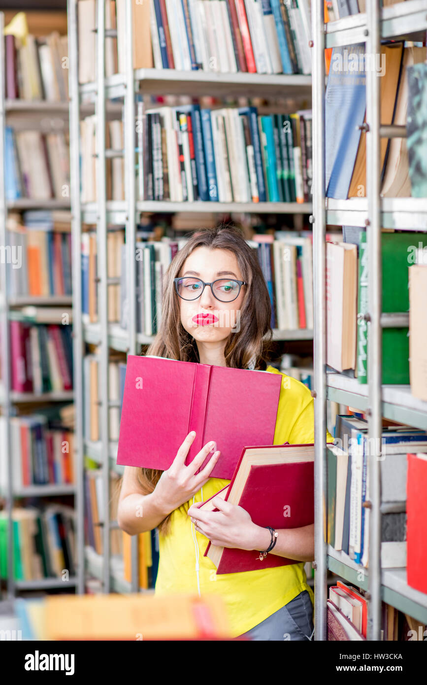 Student at the library Stock Photo - Alamy
