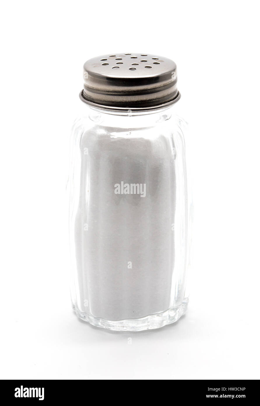 Glass salt-shaker on white background Stock Photo - Alamy