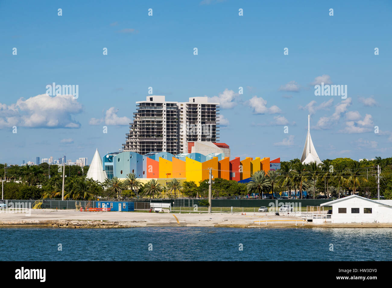 Condo Tower Past Colorful Wall in Miami Waterfront Stock Photo - Alamy