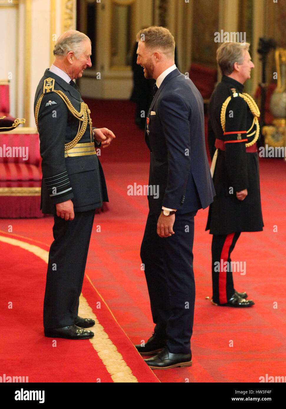 Rower William Satch is made an MBE by the Prince of Wales during an ...