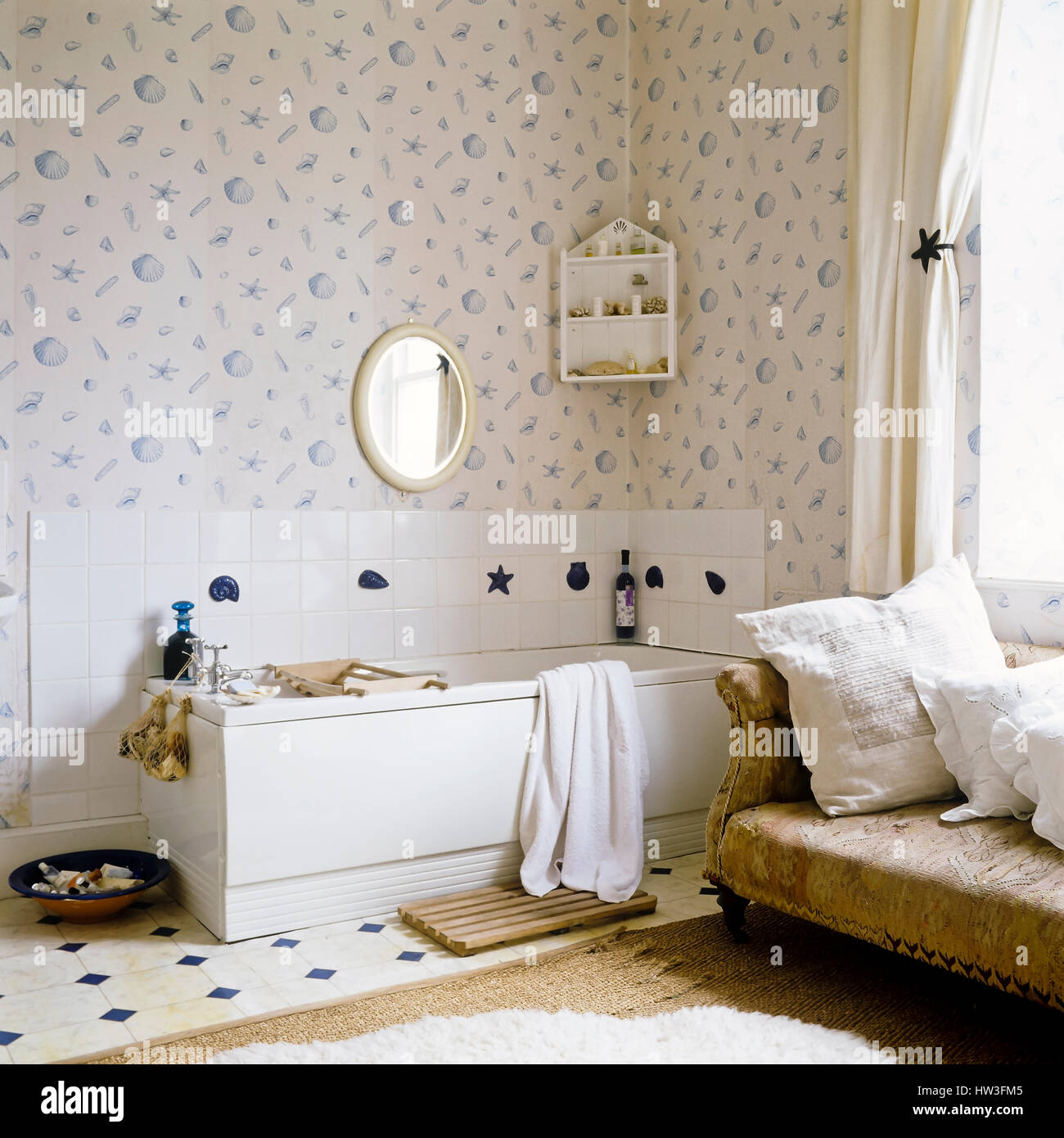 Bathroom with seashell patterned wallpaper Stock Photo - Alamy
