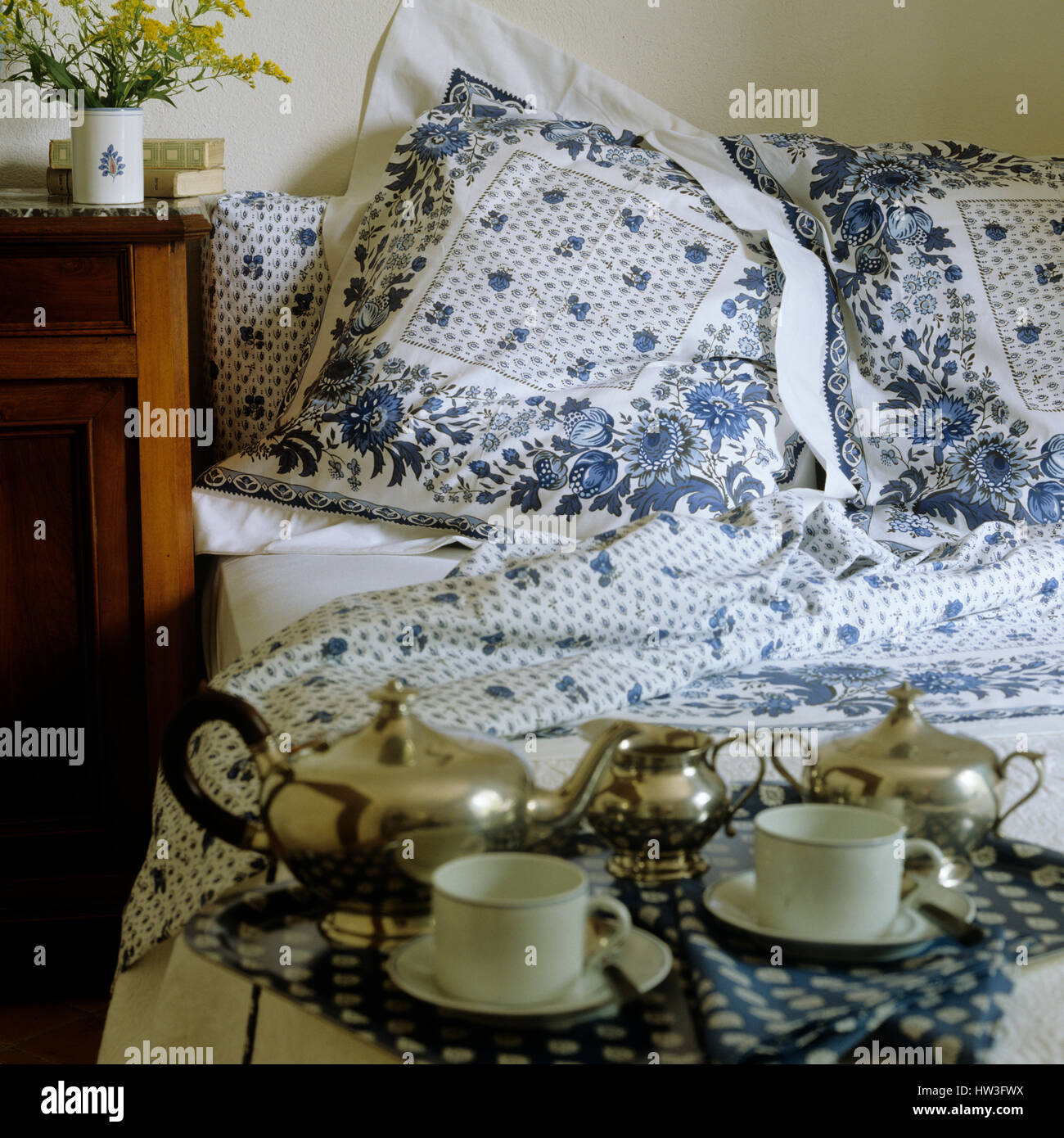 Tea service on a bed Stock Photo - Alamy