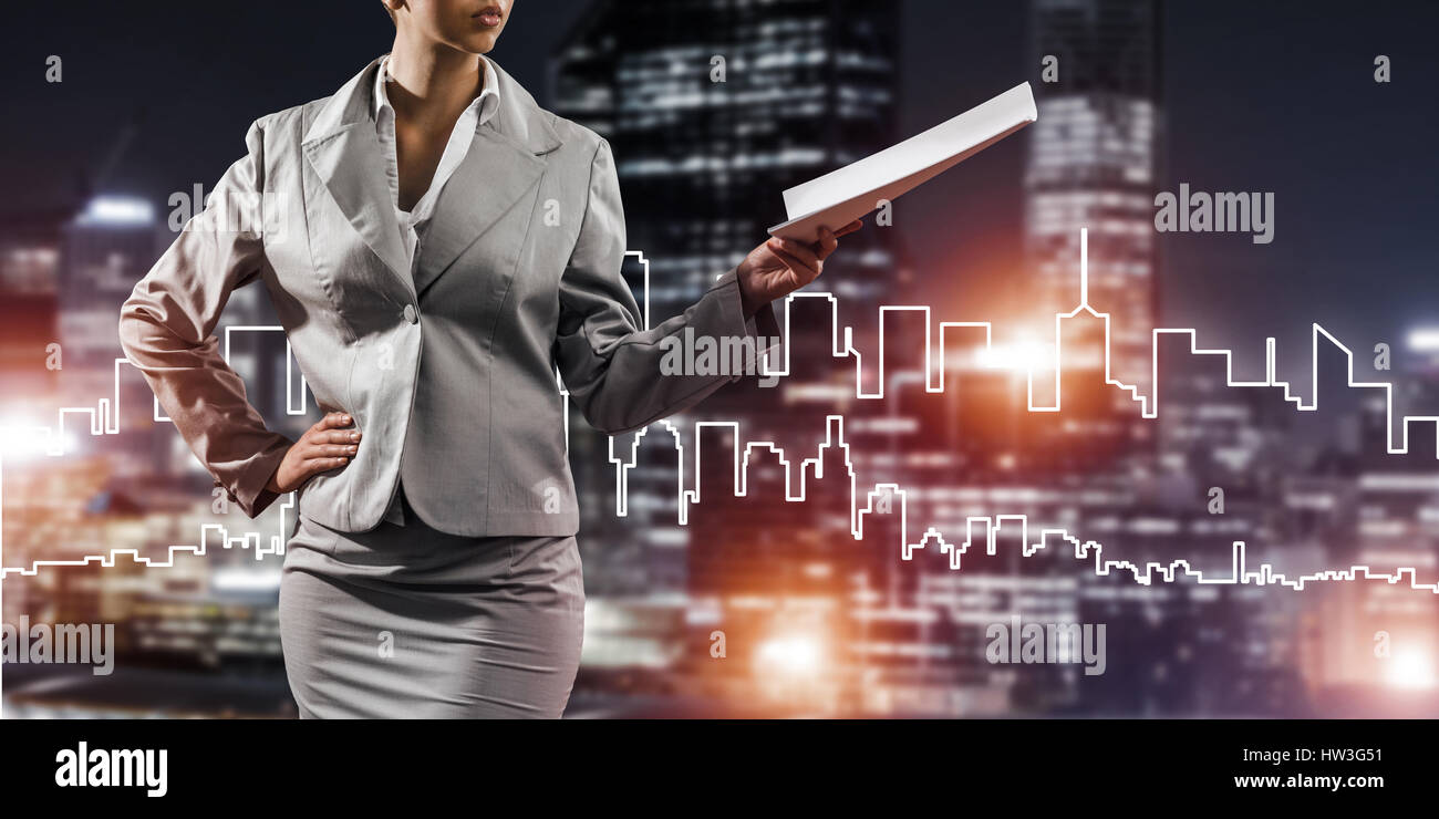 Woman architect or engineer presenting construction concept and Stock ...