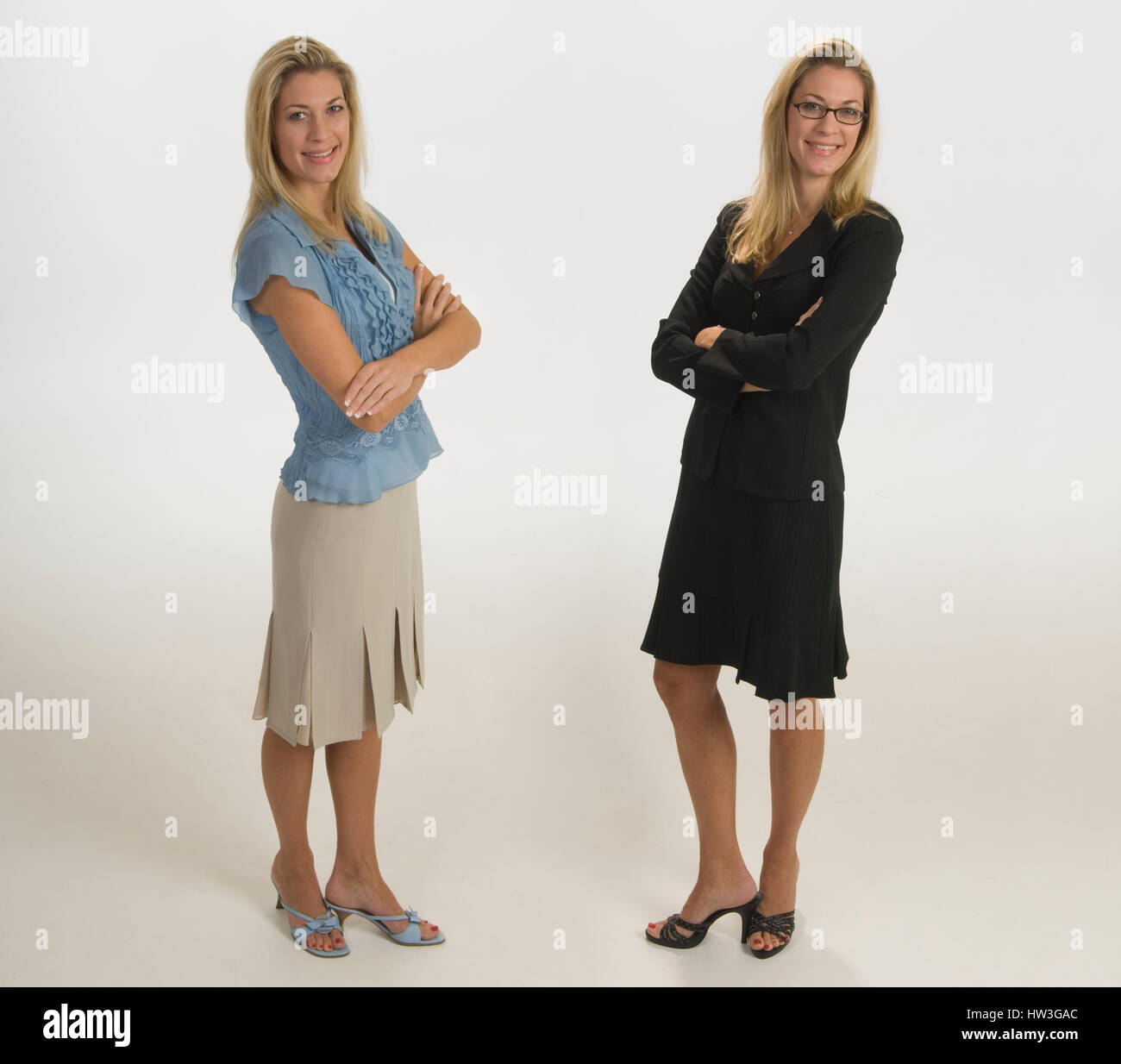 Twin women on high key background Stock Photo - Alamy