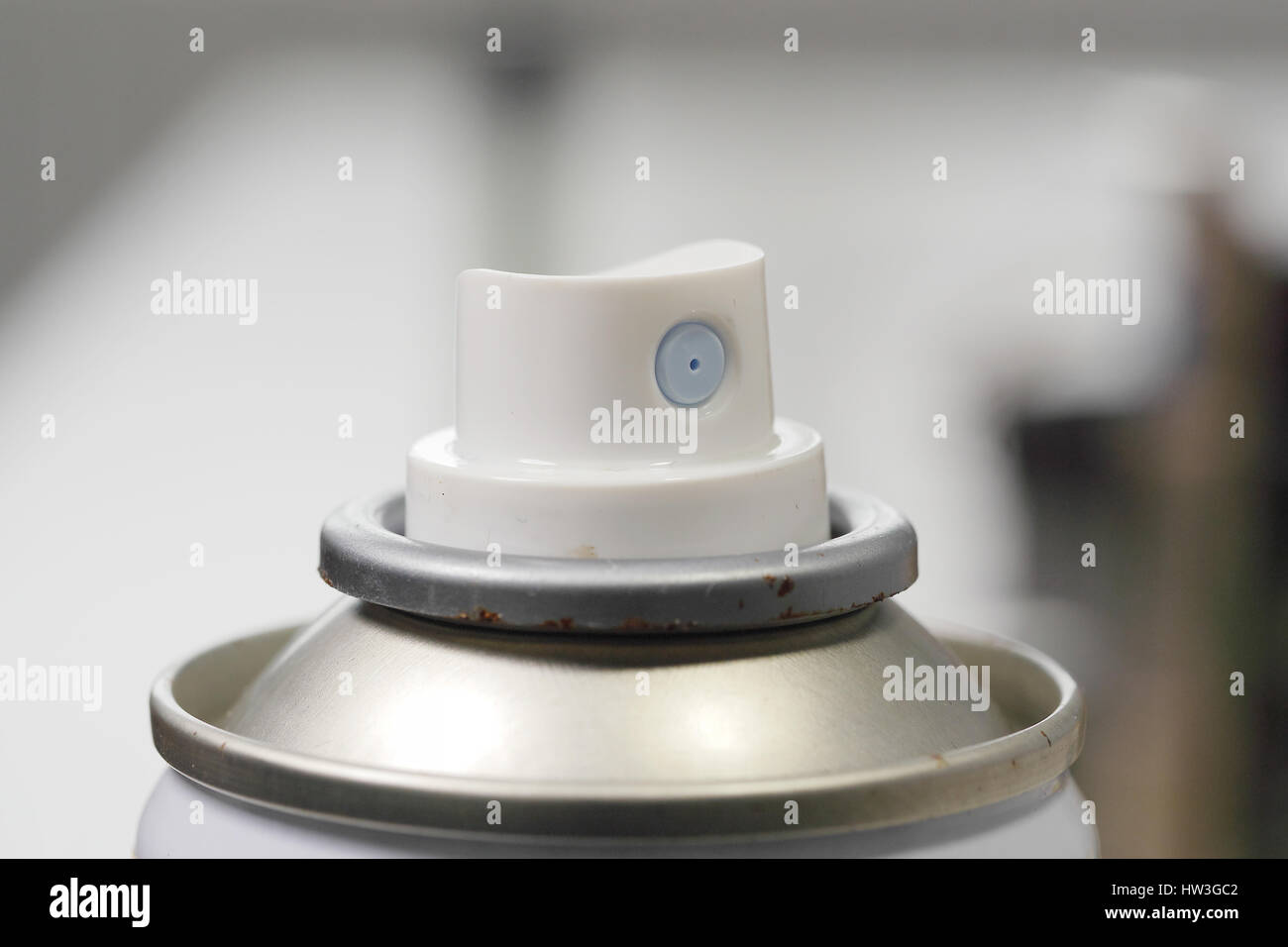 an aerosol spray cans nozzle close up Stock Photo - Alamy