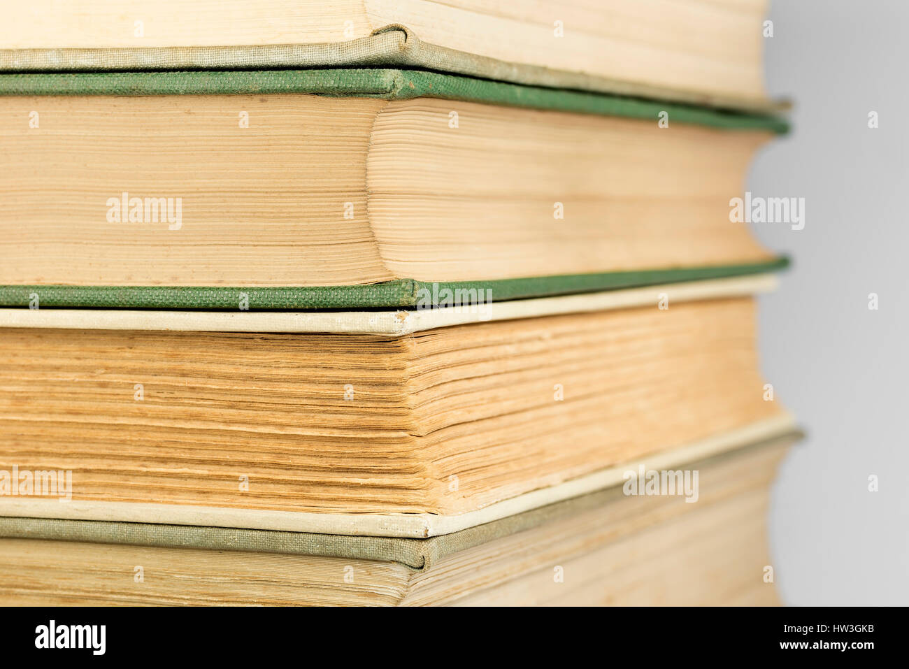 Stacked old bound and yellowed books as background picture Stock Photo ...