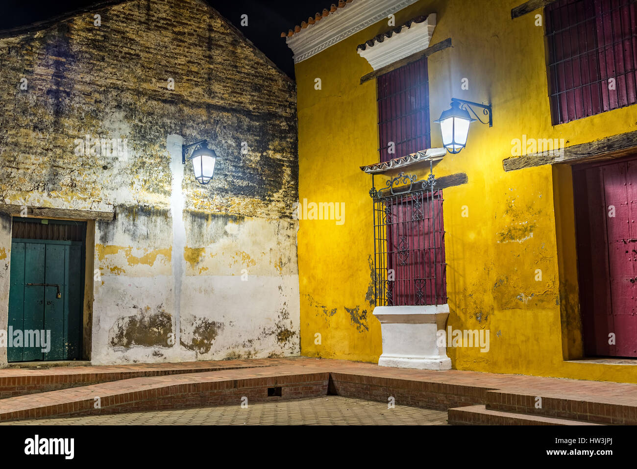 Street lights on historic colonial buildings at night in Mompox ...
