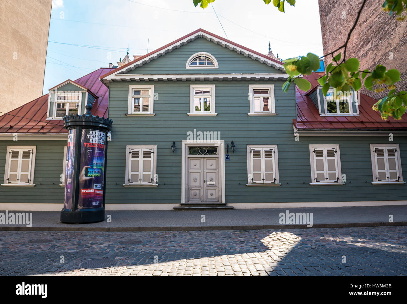 Small building with wooden facade in Gertrudes Street in Riga, capital ...