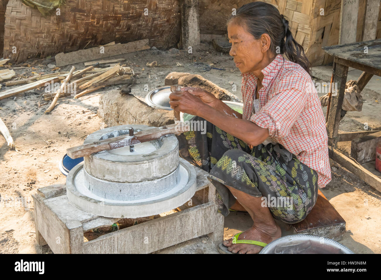 Grinding rice hi-res stock photography and images - Alamy