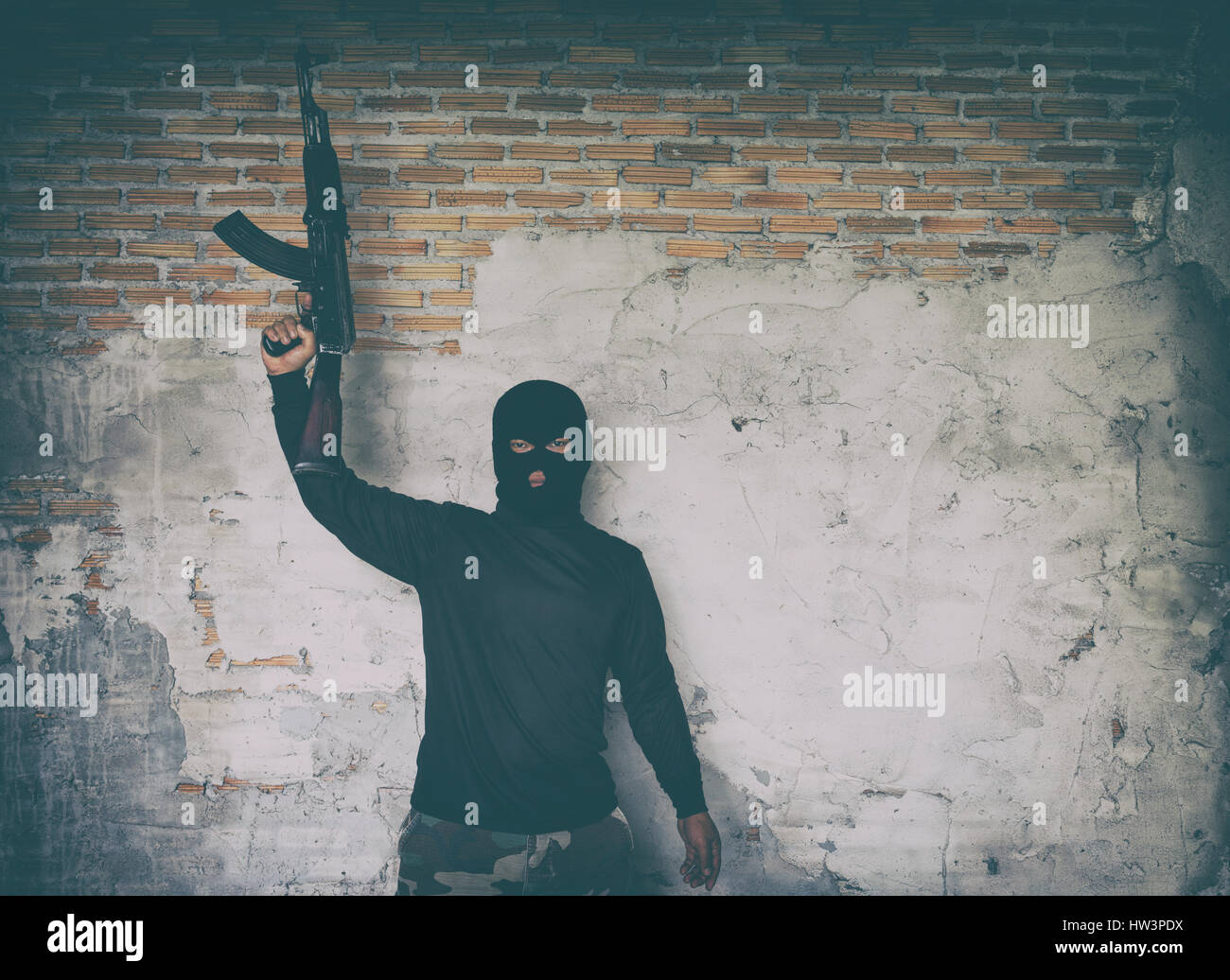 terrorist in black uniform and mask with kalashnikov ak47 Stock Photo ...