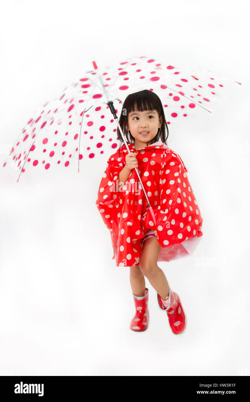 Chinese Little Girl Holding umbrella with raincoat in plain white ...