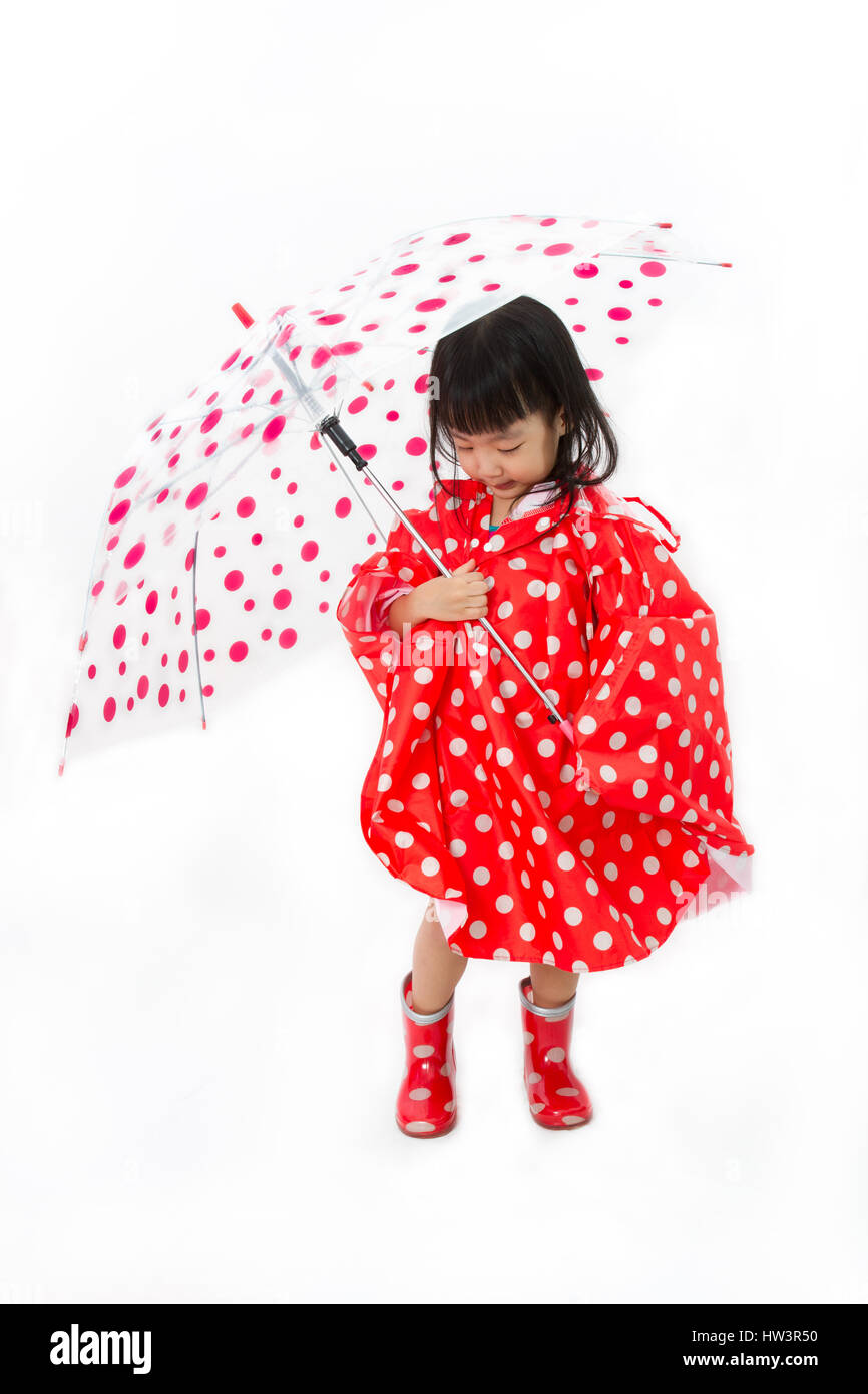 Chinese Little Girl Holding umbrella with raincoat in plain white ...