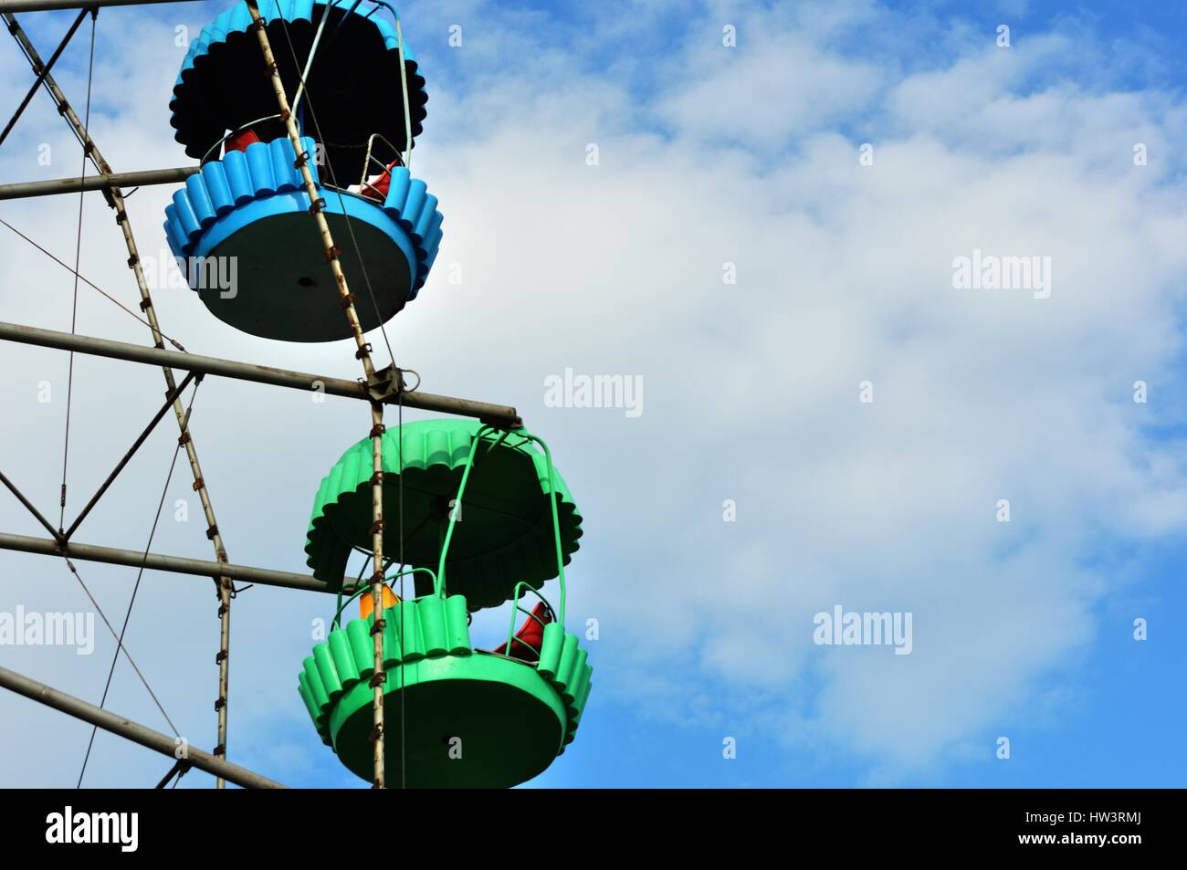 Ferris wheel in a summer amusement park Stock Photo - Alamy