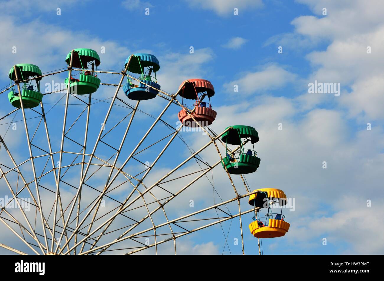 Ferris wheel in a summer amusement park Stock Photo - Alamy
