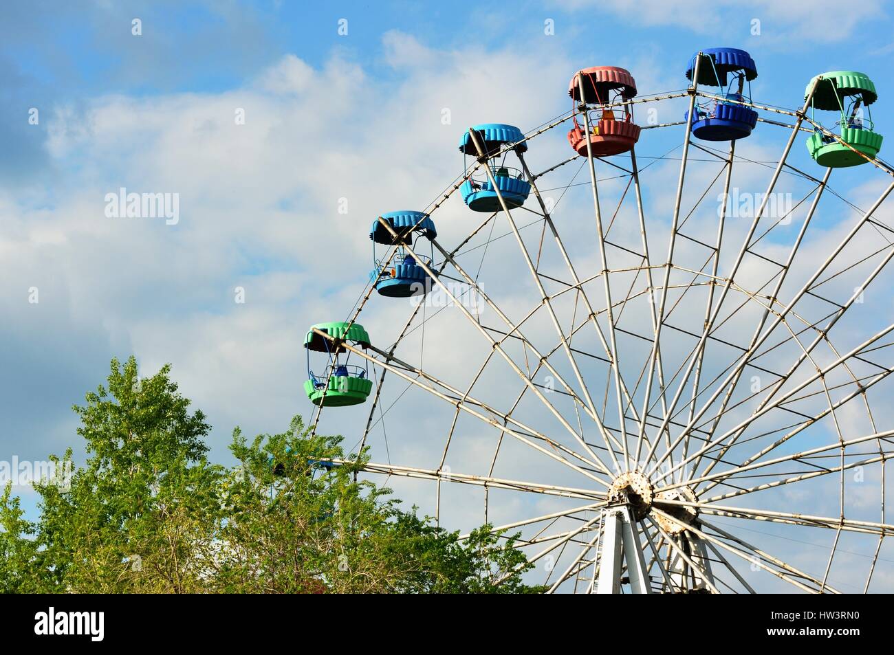 Ferris wheel in a summer amusement park Stock Photo - Alamy