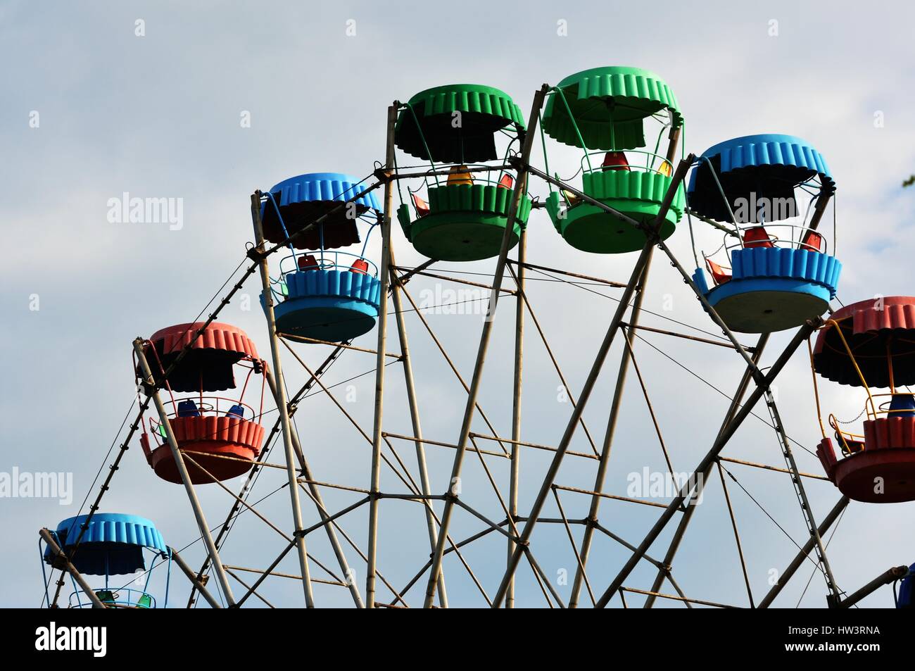 Ferris wheel in a summer amusement park Stock Photo - Alamy