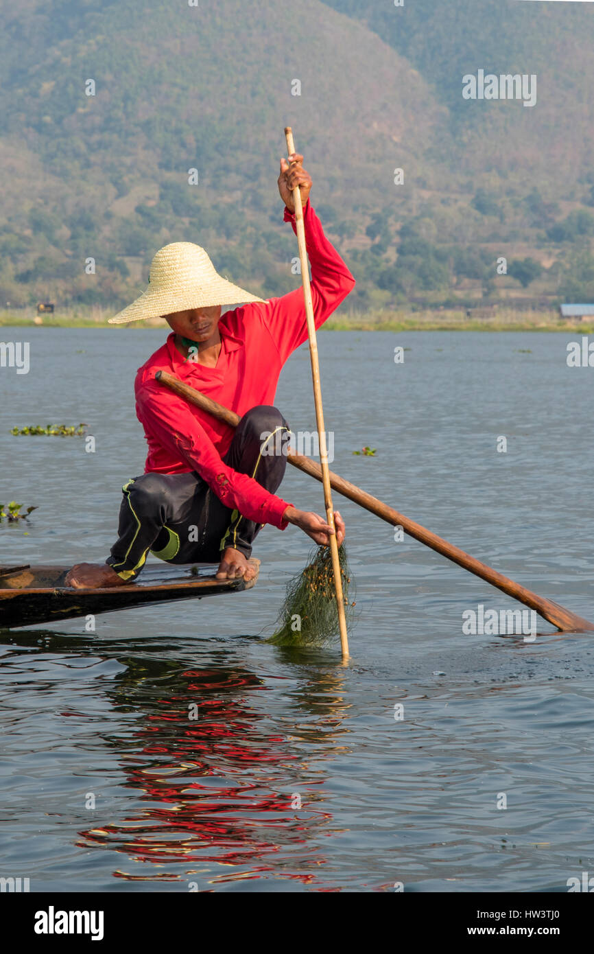 Catching a Fish on Inle Lake, Myanmar Stock Photo - Alamy