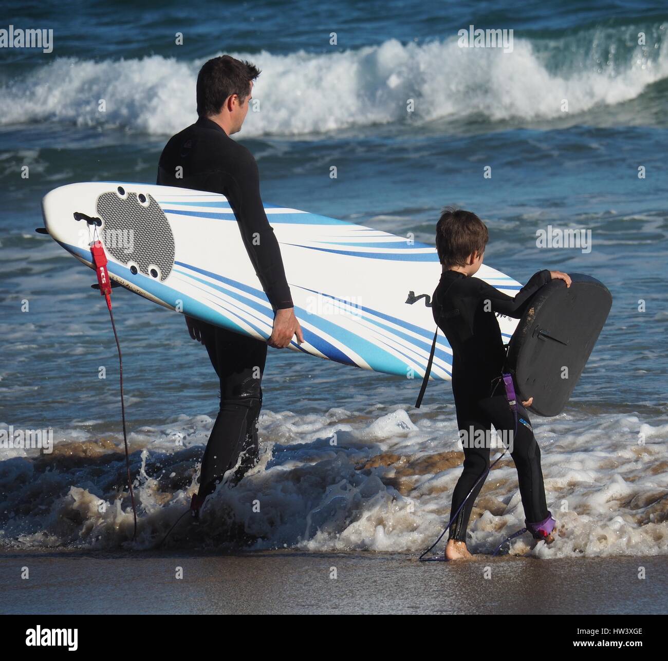 Father and Son Surfing Stock Photo - Alamy