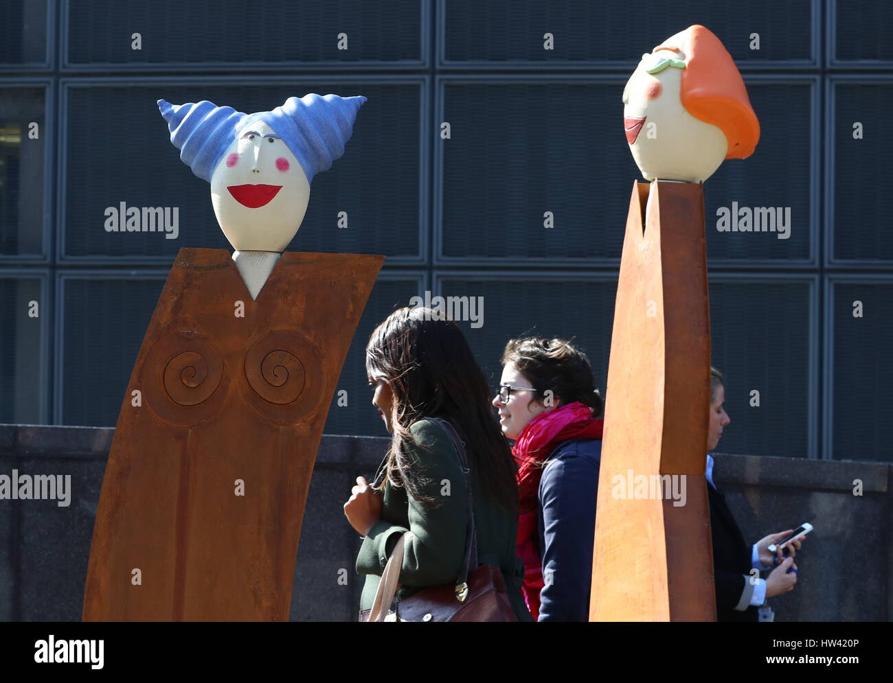 Brussels, Netherlands. 25th Mar, 1957. Pedestrians walk past the ...