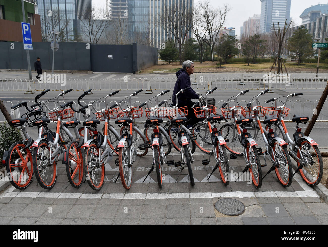 Beijing, China. 17th Mar, 2017. Shared bikes park at a recommended site ...