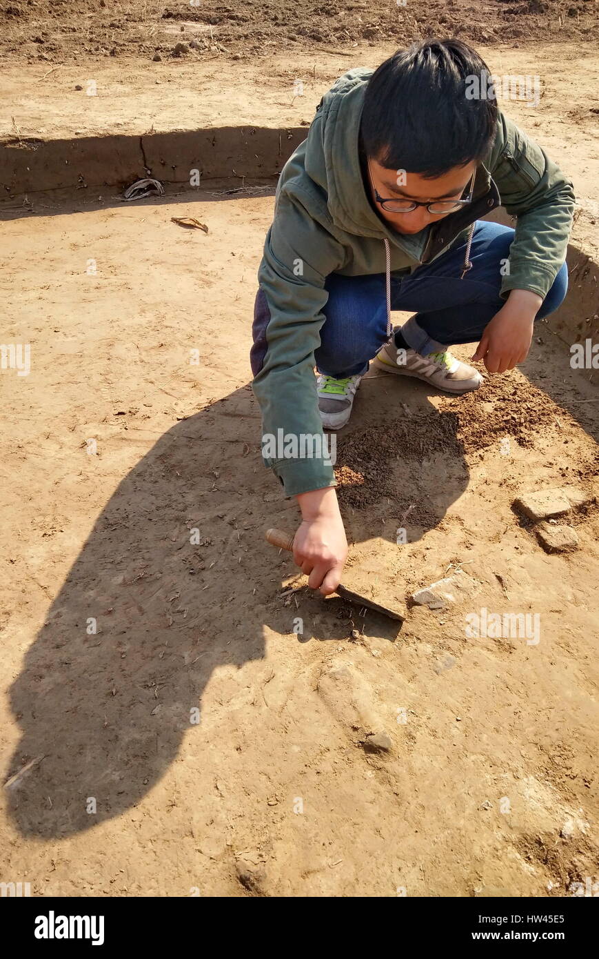 Shijiazhuang, China's Hebei Province. 17th Mar, 2017. An archaeologist ...